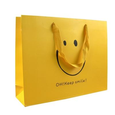 China High End Luxury Retail Foldable Colored Cardboard Cute Paper Shopping Bags with Custom Pattern for sale