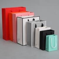 China Customized Logo Eco-friendly Card Paper Carrier Bag with CMYK 4 Color Offset Printing for sale