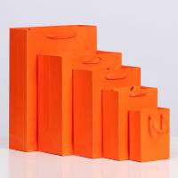 China Customized Logo Eco-friendly Card Paper Carrier Bag with CMYK 4 Color Offset Printing for sale