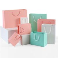 China CMYK 4 Color Offset Printing Paper Bag With Handles for Custom Gifts Shopping Packaging for sale