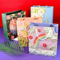 China Gravure Printing Custom Order Luxury Boutique Gift Shopping Tote Art Paper Bags With Logo for sale