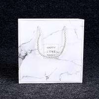 China Customized Logo Retail Gift Shopping Boutique Paper Bag With Logo For Your Requirements for sale