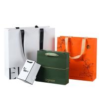 China Customized Logo Accepted Ivory Board Paper Bags for Boutique Requirement for sale