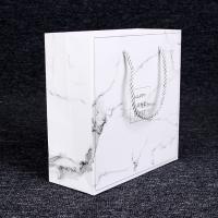 China Customized Logo Retail Gift Shopping Boutique Paper Bag With Logo For Your Requirements for sale