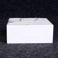 China Customized Logo Retail Gift Shopping Boutique Paper Bag With Logo For Your Requirements for sale