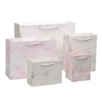 China Custom Reasonable Boutique Retail Paper Gift Shopping Rope Handle Bag Custom Order for sale