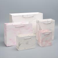 China Custom Reasonable Boutique Retail Paper Gift Shopping Rope Handle Bag Custom Order for sale