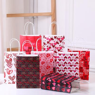 China Valentine's Day Red Color Cmyk Gift Shopping Kraft Paper Bag Customized Custom Order for sale