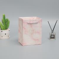 China Custom Reasonable Boutique Retail Paper Gift Shopping Rope Handle Bag Custom Order for sale