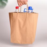 China Competitive Eco-Friendly Folding Brown Kraft Paper Shopping Bag with Customized Logo for sale