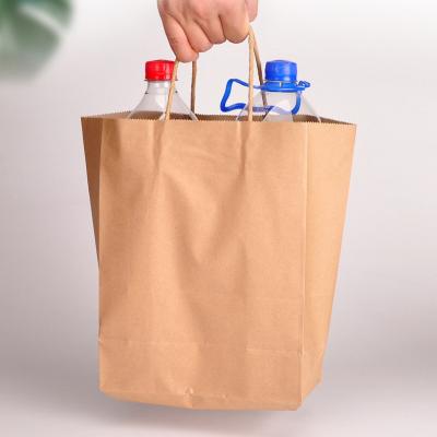 China Competitive Eco-Friendly Folding Brown Kraft Paper Shopping Bag with Customized Logo for sale