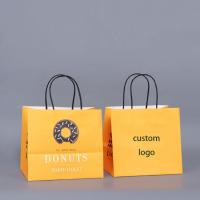 China CMYK 4 Color Offset Printing Kraft Paper Handle Bags for Customized Luxury Packaging for sale