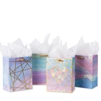 China Designer Folding Glossy Shopping Paper Bag With Ribbon Handle and Gravure Printing for sale