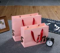 China Hand Length Handle Ins Style Pink Paper Bags for Boutique Gift Craft Shopping Custom Order for sale
