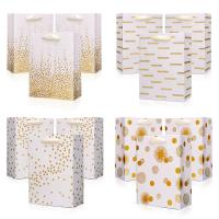 China Art Paper Custom Type Wrapping Luxury Clothing Gift Boutique Shopping Paper Bag for sale