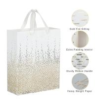 China Art Paper Custom Type Wrapping Luxury Clothing Gift Boutique Shopping Paper Bag for sale