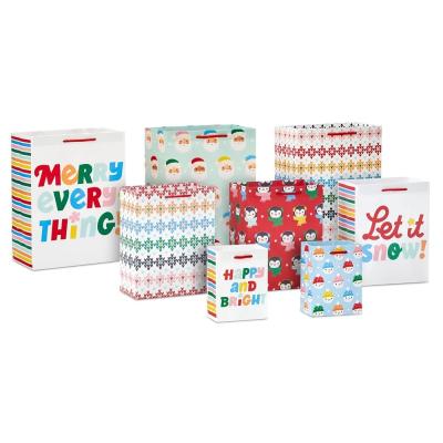 China Custom Printed Cute Cartoon Gift Packaging Shopping Paper Bag with Folding Style for sale