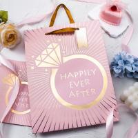 China Custom Color Accepted Ivory Board Wedding Gift Paper Bags for Special Occasion Gifts for sale