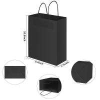 China Exhibition Custom Black Kraft Paper Bags With Your Own Logo at and Hand Length Handle for sale