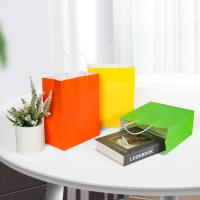 China Retail Multi Colored Kraft Paper Shopping Bags with Folding Style and Custom Pattern for sale