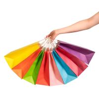 China Retail Multi Colored Kraft Paper Shopping Bags with Folding Style and Custom Pattern for sale