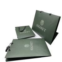 China Customized Gift Jewelry Paper Bags with Logo and Handles for sale
