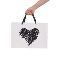 China Specialty Paper Fashion Industry Valentine's Day Gift Shopping Hand Length Handle Bags for sale