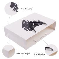 China Specialty Paper Fashion Industry Valentine's Day Gift Shopping Hand Length Handle Bags for sale