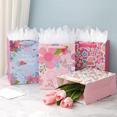 China Custom Color Accepted Fashion Flower Printing Fancy Shopping Paper Bags For Presents for sale