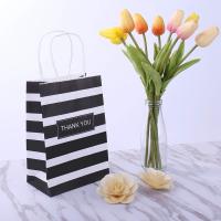 China Custom Private Logo Printed Stripe Kraft Paper Bag for Business Shopping Custom Orders for sale