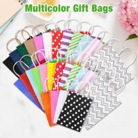 China Handmade Biodegradable Eco-Friendly Striped Pastel Candy Sweet Tote Shopping Kraft Paper Bags for sale