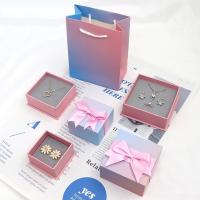 China Color Shape and Logo Custom Gift Jewelry Storage Box with Ribbon Bow Gravnre Printing for sale