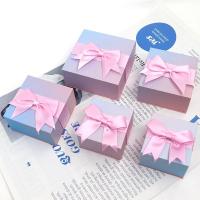 China Color Shape and Logo Custom Gift Jewelry Storage Box with Ribbon Bow Gravnre Printing for sale