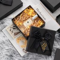 China Custom Cosmetic Perfume Bottle Gift Box With Black Bow Ribbon Lid And Base Packaging for sale