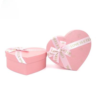 China Custom 2024 Valentine's Day Luxury Gift Box With Bow Ribbon Heart Shaped Pink Paper for sale