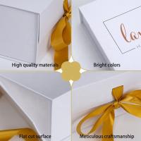 China Gift Craft Pink Paper Box with Ribbon and Folding Lid Custom Shape Logo Packaging Box for sale