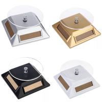 China 360 Degree Rotating Solar Display Stand with LED Light - 10x10x4.5cm for Mobile Phones Jewelry Watches for sale