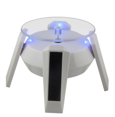 China Energy Saving LED Solar Display Stand with 360 Degree Rotation - 13x13x8cm Size, 133g Weight for Mobile Phones and Jewelry for sale