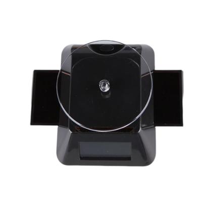 China 90mm Acrylic Solar Powered Display Turntable with 140g Weight and Logo Customization for Retail for sale