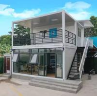 China Steel Door Detachable Modular Multistory Prefab House Containers Homes Buildings for sale