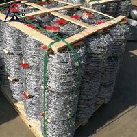 China BWG16 Barbed Iron Wire Price Per Roll 14 Gauge Hot Dipped Galvanized Barb Wire Roll for sale