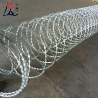 China Single Loop BTO-10 Concertina Razor Barded Wire Rust Proof Stainless Steel for sale