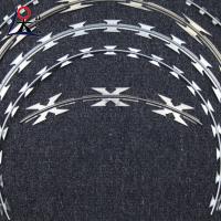 China Spring Snake Razor High Tensile Barbed Wire Hot Dip Galvanized for sale