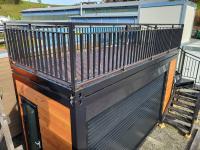 China 20ft Flat Pack Container Modern Design Steel Prefabricated Mobile Home Coffee Bar Shop with Terrace and Outdoor Application for sale