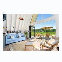 China EU Triangle A-Shaped Steel Structure Frame Room Modern Tiny House Prefab Kit Luxury Triangle A-Frame House with Wooden Houses for sale