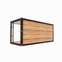 China Galvanized Steel Square Tubes Modern Design Container House with Wooden Exterior Garden and Independent Restaurant for sale