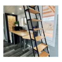 China Customized Color 40ft LOFT Family Style Mobile House with Prefabricated Steel Structure and Wooden Exterior Wall for sale