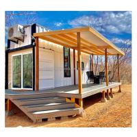 China Customized Color 40ft LOFT Family Style Mobile House with Prefabricated Steel Structure and Wooden Exterior Wall for sale