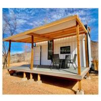 China Customized Color 40ft LOFT Family Style Mobile House with Prefabricated Steel Structure and Wooden Exterior Wall for sale