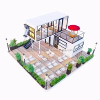 China Steel Structure Frame Welded 20ft Luxury Portable Prefabricated Homes With Customized Color for Food Street Coffee Store for sale